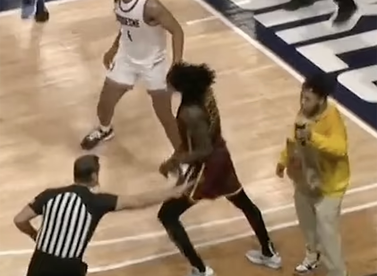 Moment Guy Delivers McDonald's Order to Basketball Game