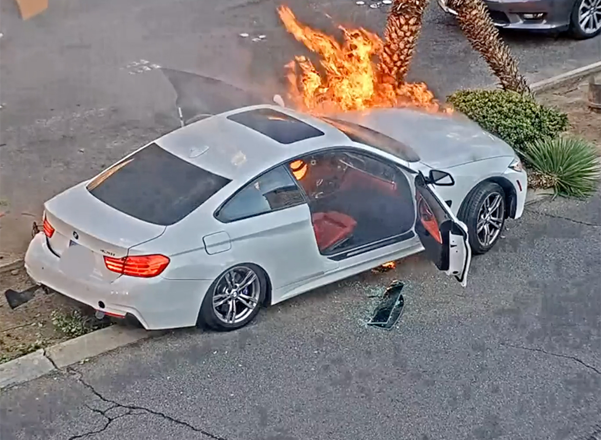 Police Officer And Good Samaritan Rescue Unconscious Driver