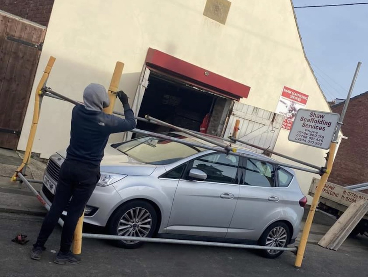 Man Builds Scaffolding Around Car That Blocked His Gate