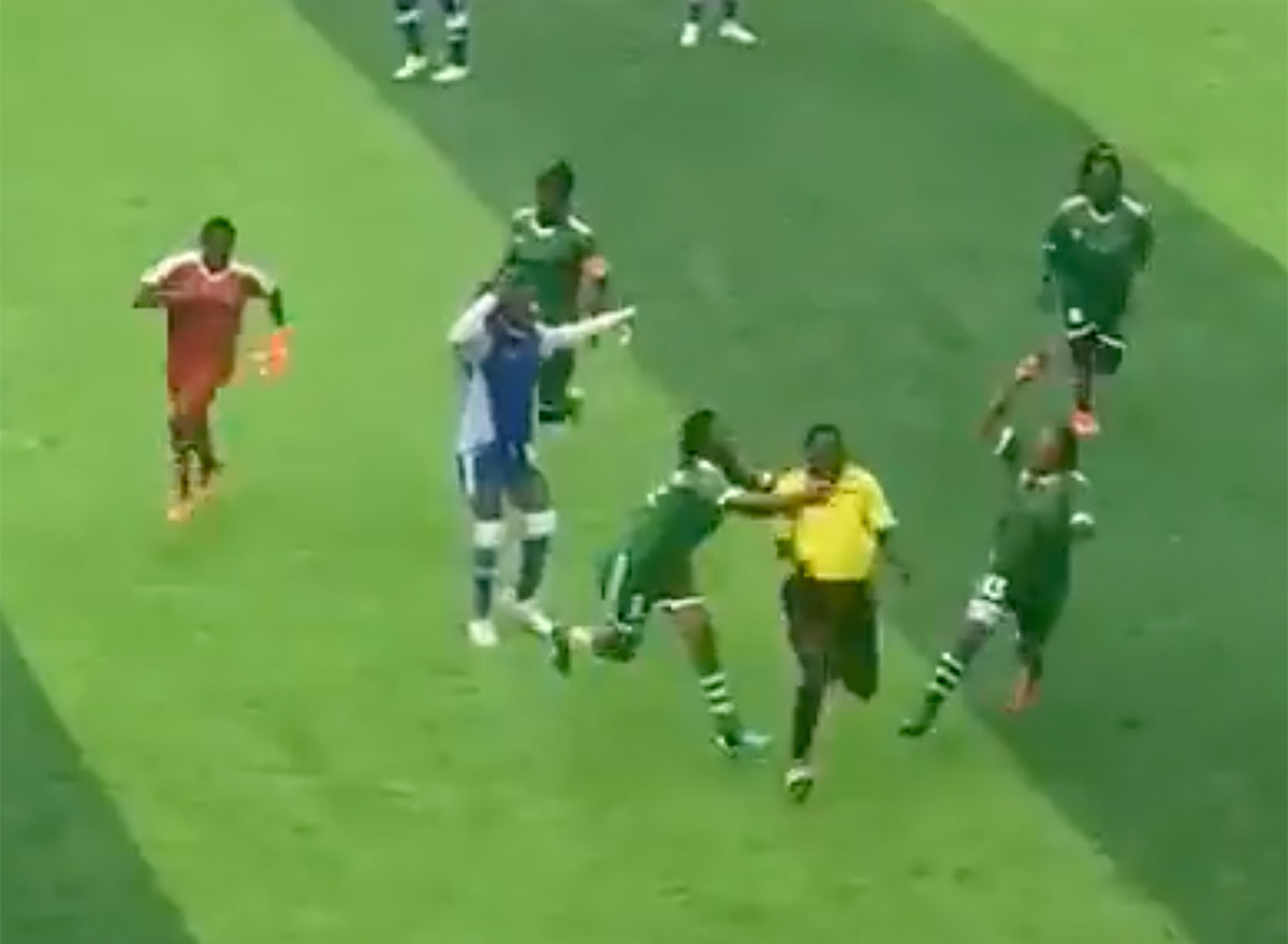 Women Soccer Players Chase, Hit and Kick Male Referee