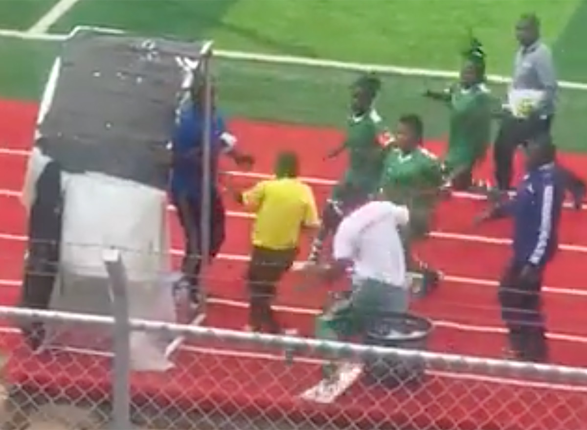 Women Soccer Players Chase, Hit and Kick Male Referee