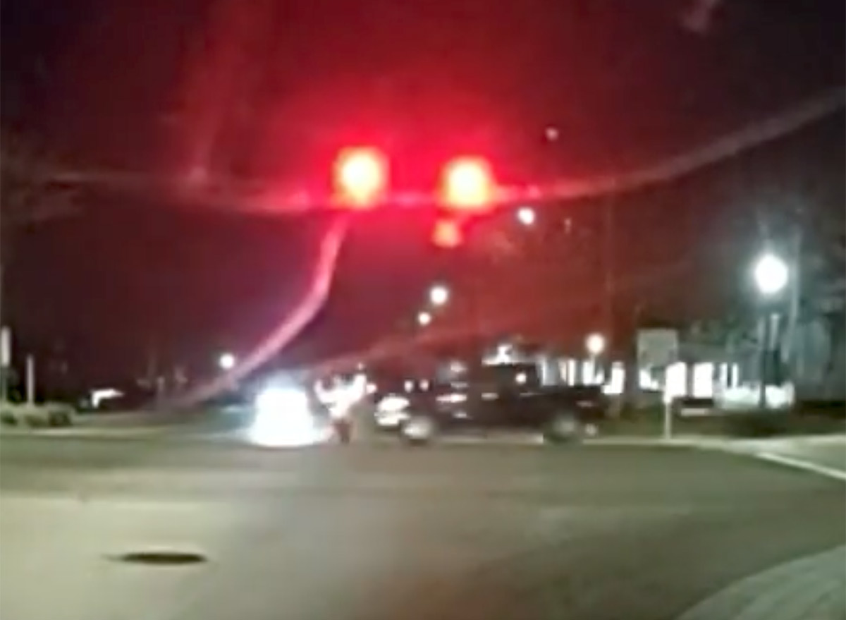 Biker Wheelies, Runs Red Light, Flips Off Deputies, Hit by Truck
