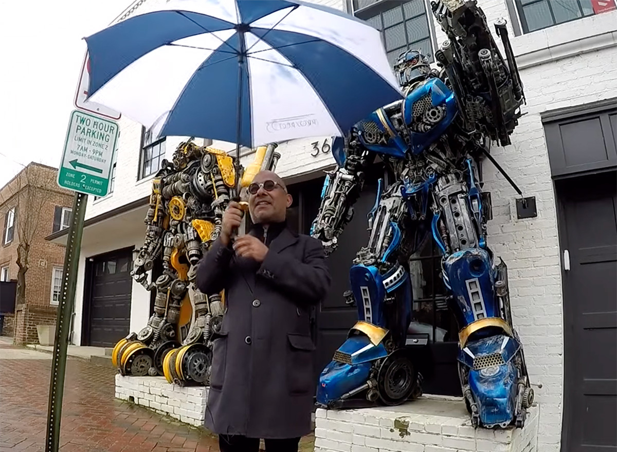 Man Defends Transformers Statues at Home