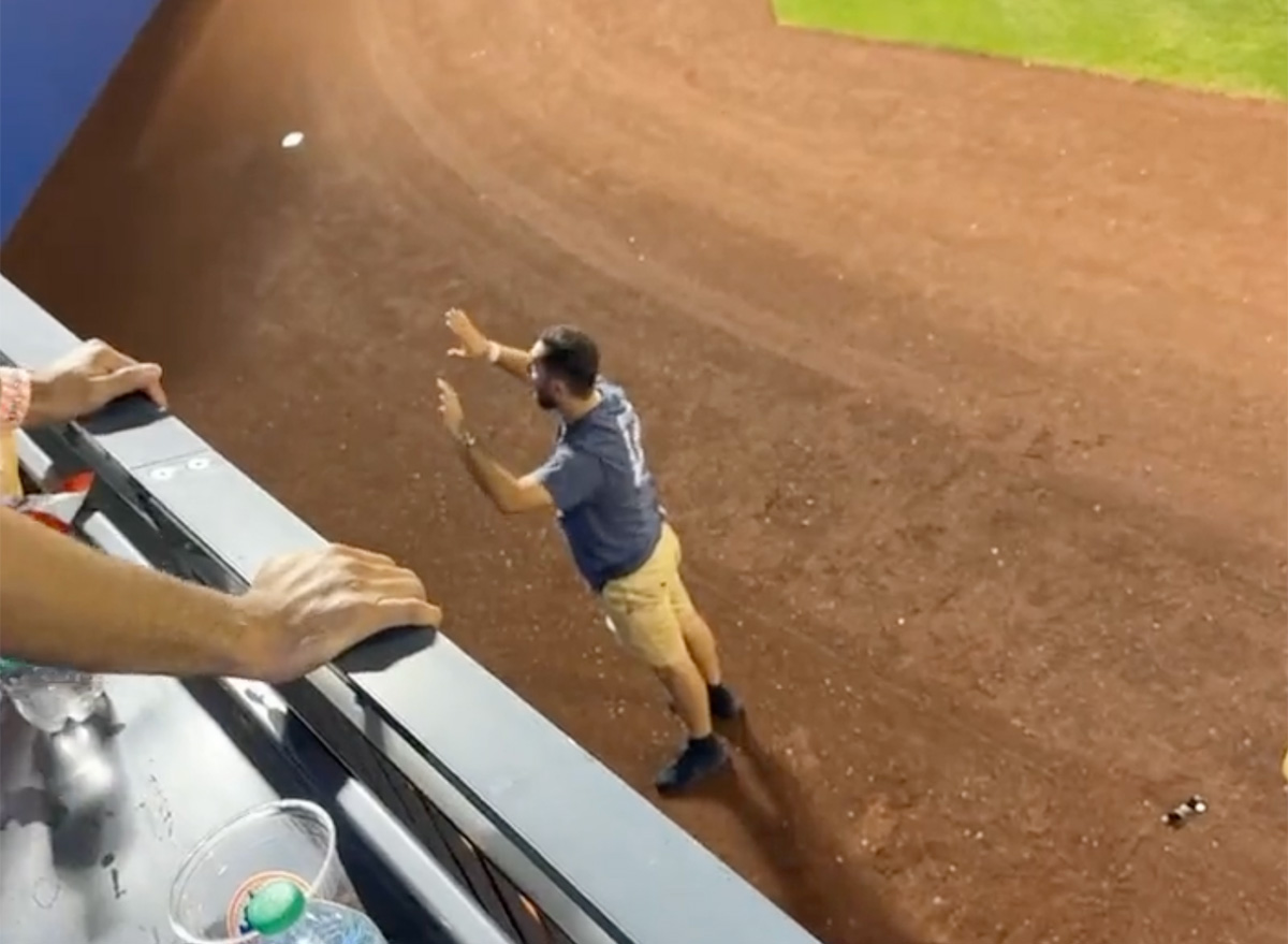 Mets Fan Falls 12 Feet Over Railing Onto Field